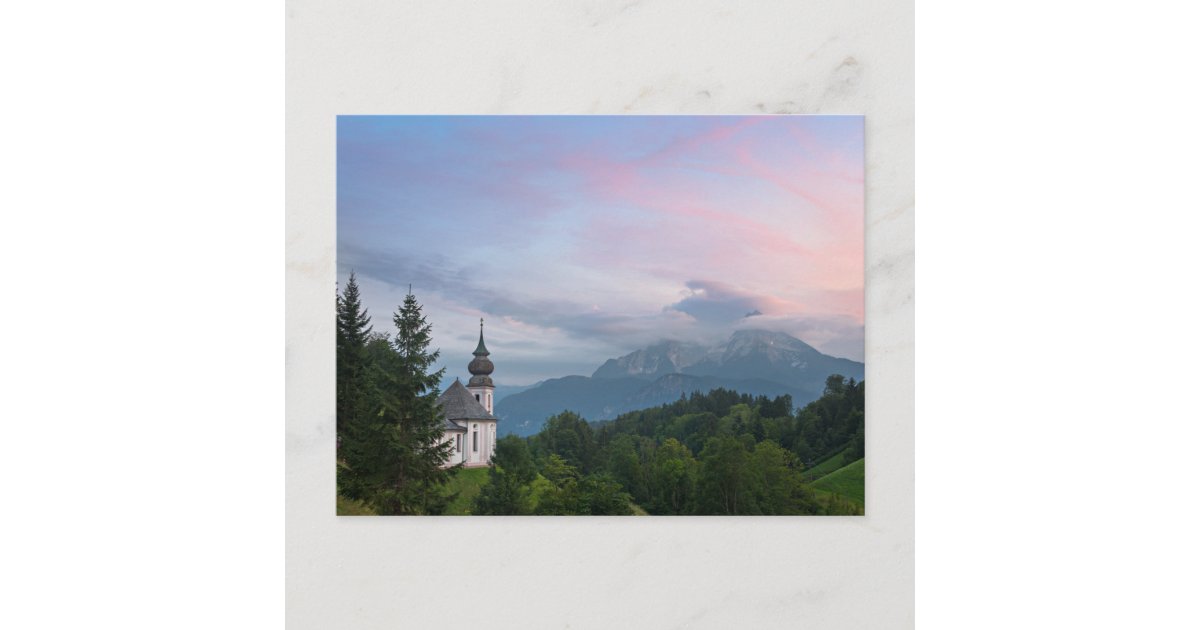Church with Alps mountains at sunset Postcard | Zazzle