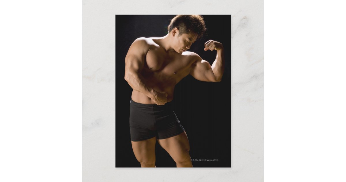 Male bodybuilder flexing muscles, front view, postcard | Zazzle
