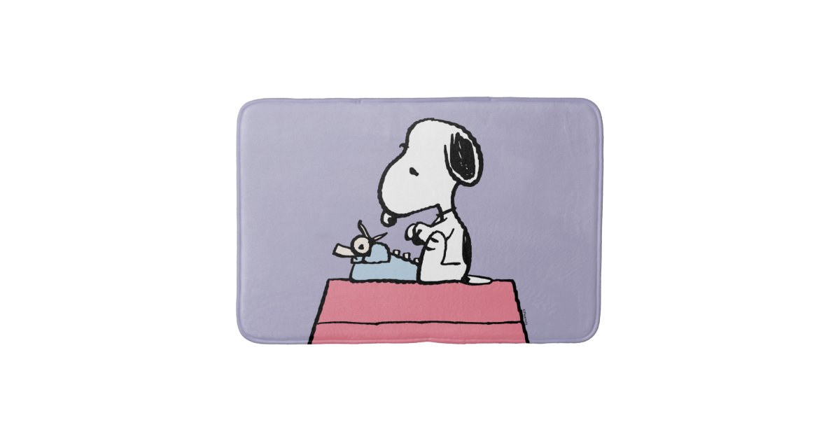 Peanuts | Snoopy at the Typewriter Bath Mat | Zazzle