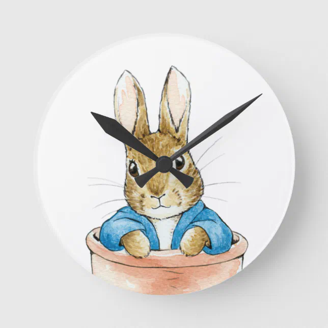 Peter the Rabbit Sitting in a Pot Round Clock | Zazzle