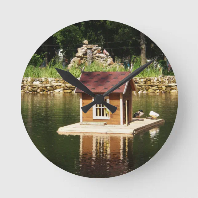 Pond with bird house round clock | Zazzle