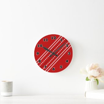 Red cricket ball sports clock for club or home | Zazzle
