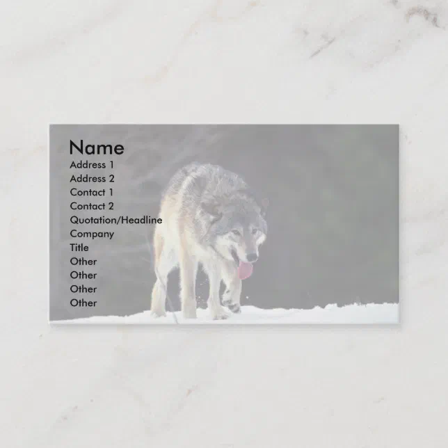 Wolf on snowy horizon business card | Zazzle