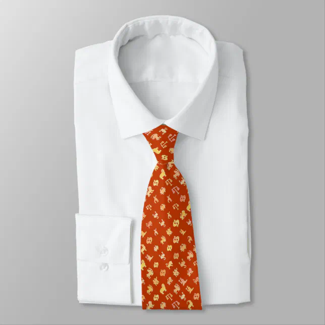Zodiac symbols, rust red background tie | Zazzle